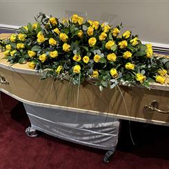 Yellow rose casket spray